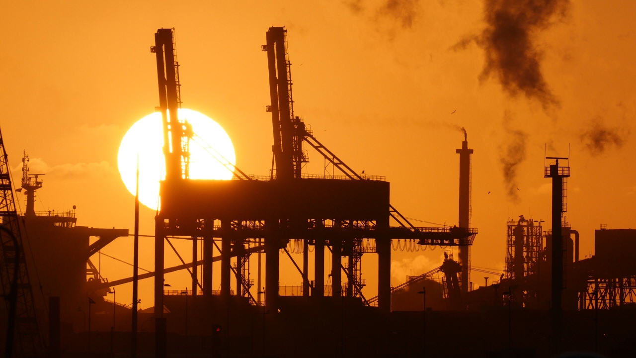 Sunset behind factory - YouTube