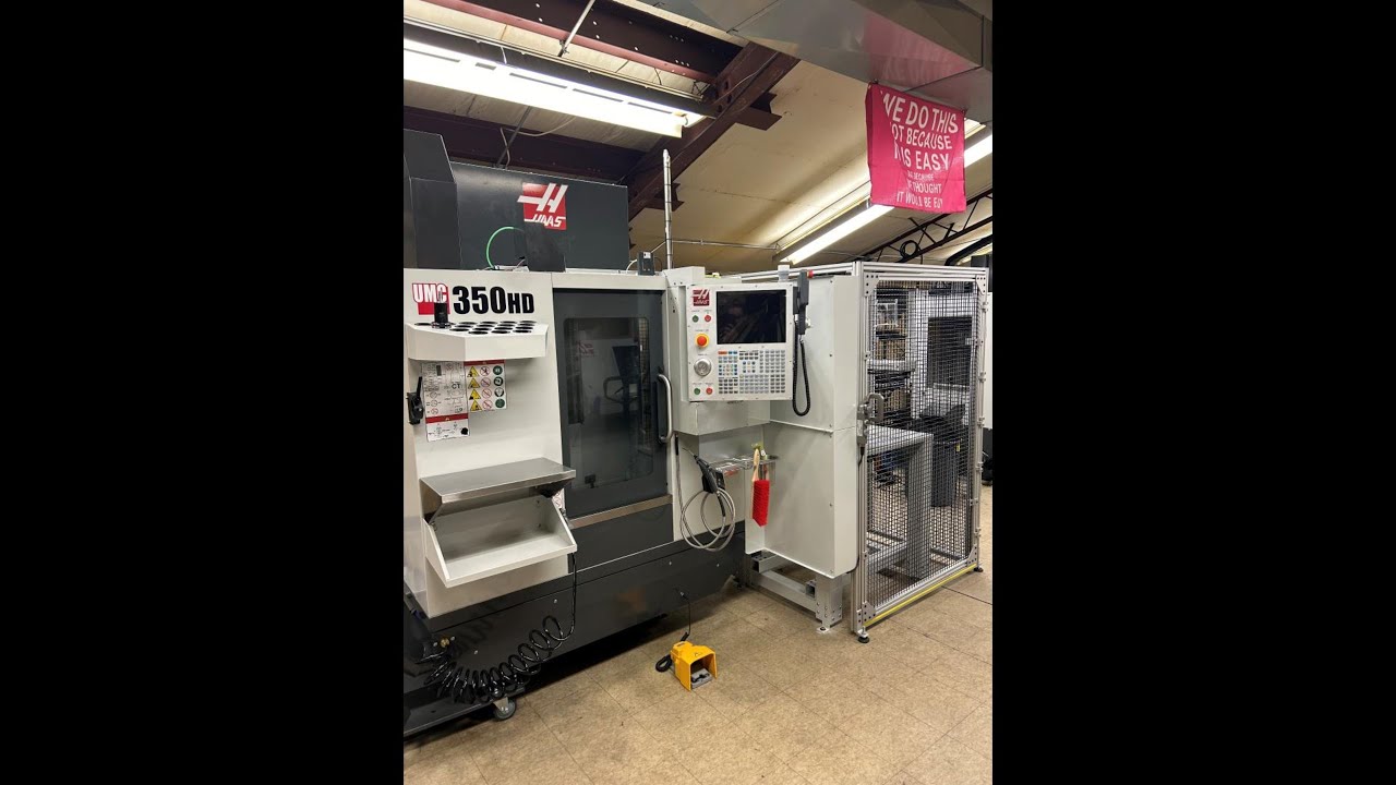 Haas UMC 350HD with Compact APL - YouTube