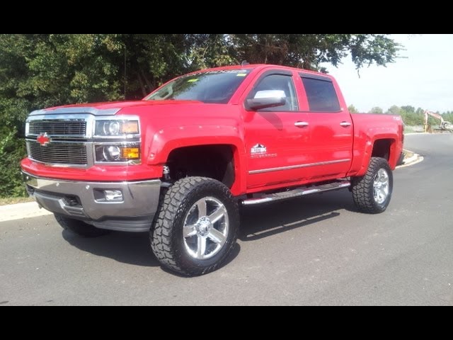 Jacked Up Red Chevy Trucks