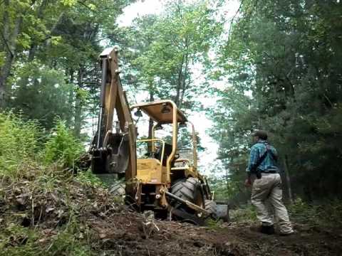 Building the road with my backhoe - YouTube
