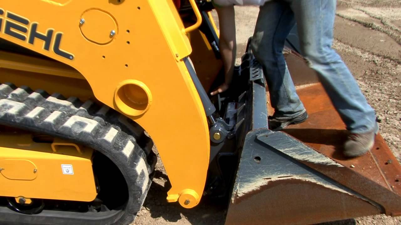 Gehl RT Series Track Loaders Attachment System - YouTube