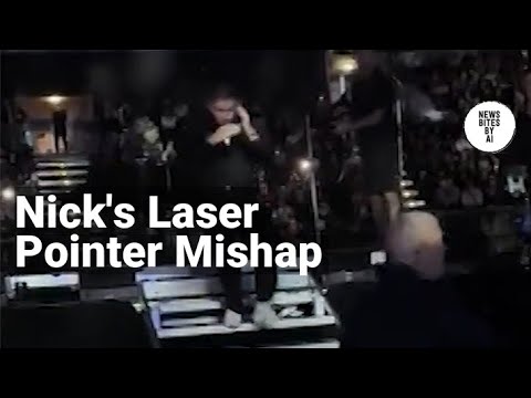 Nick Jonas Hits Head with Red Laser Pointer in Prague - YouTube