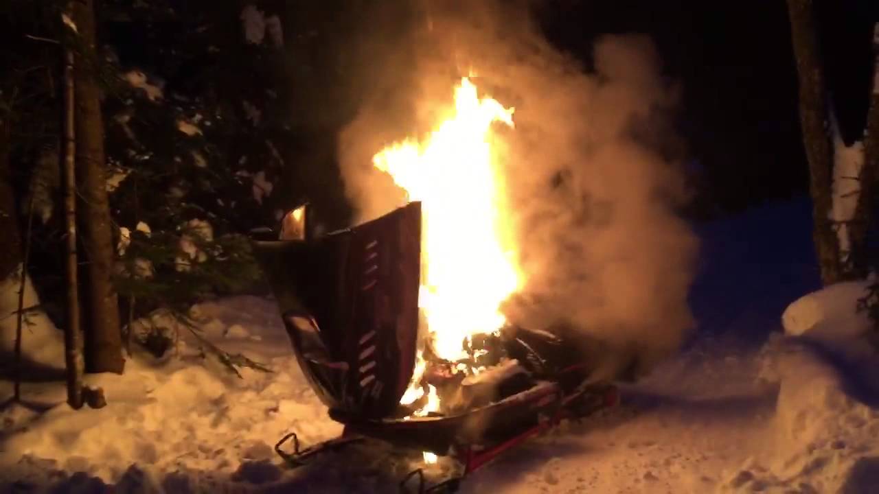 Snowmobile fire - YouTube