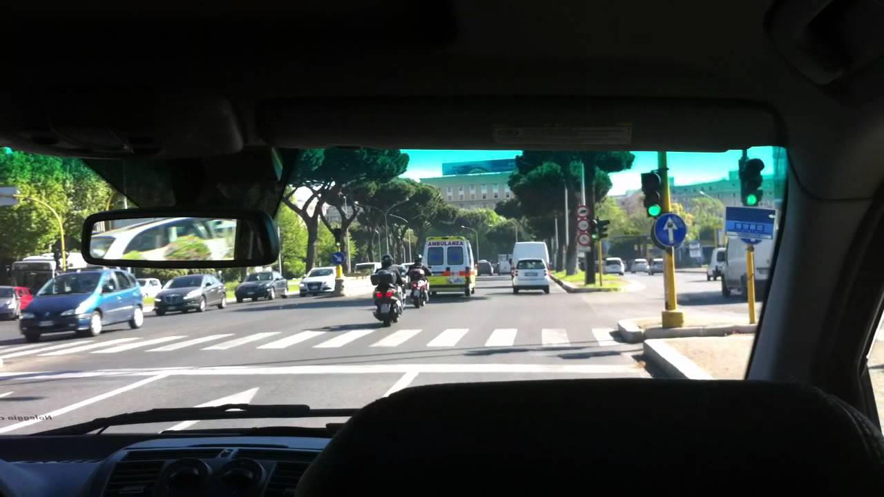 Rome Entering Rome Ambulance with Mickey Mouse on it - YouTube