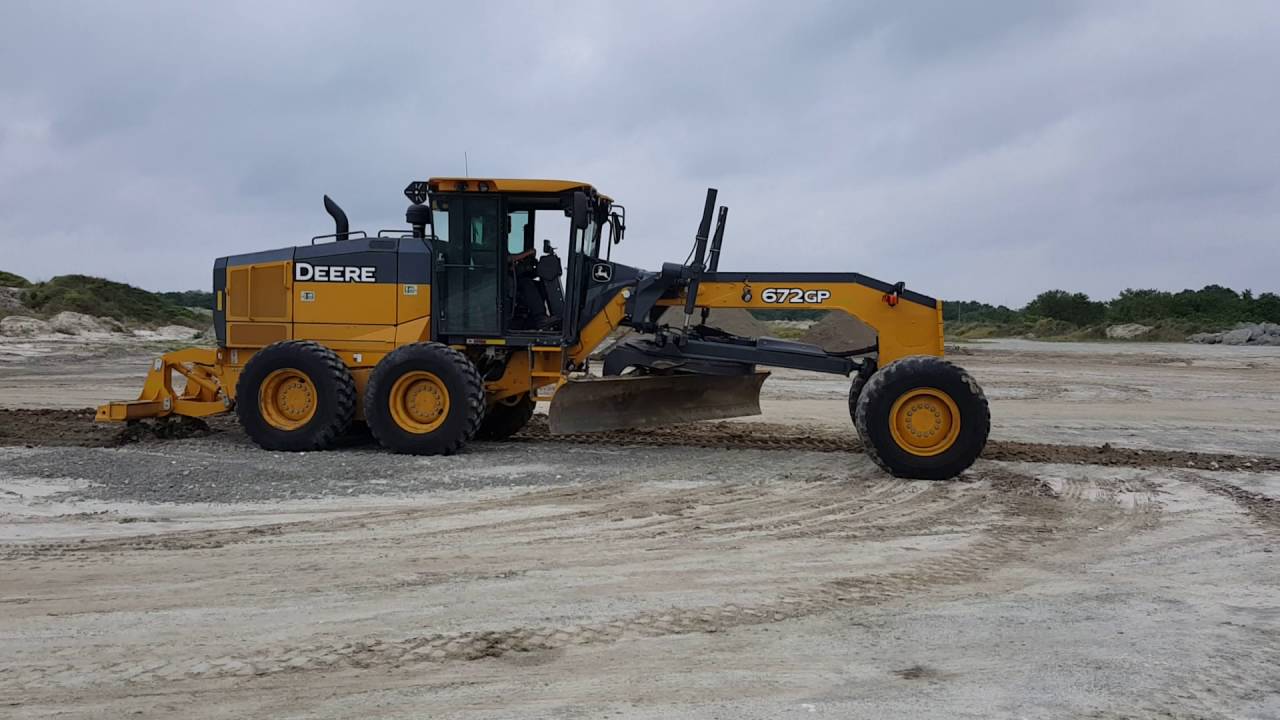 Our grader with rear scarifier at work - YouTube