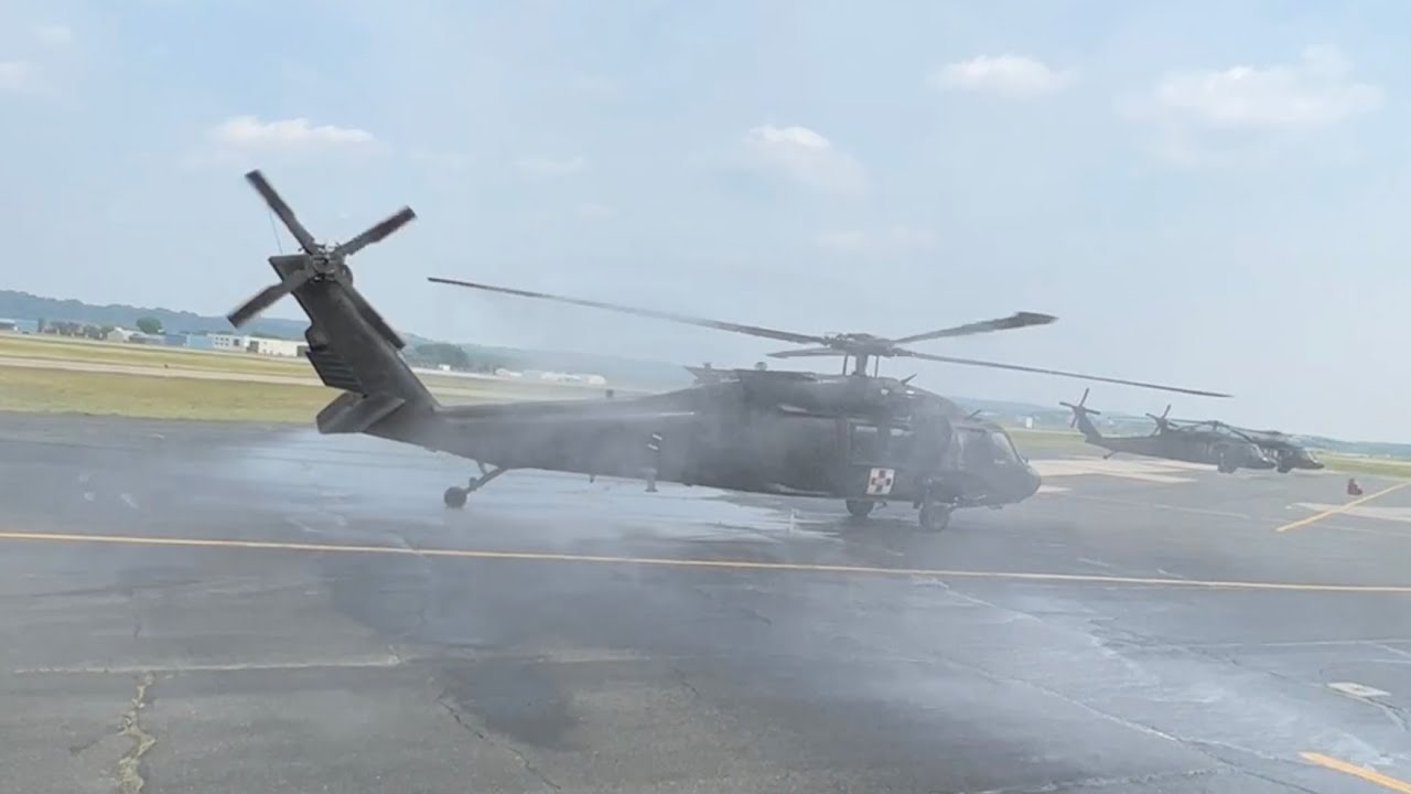 Retiring MN National Guard Blackhawk pilot final flight water salute ...