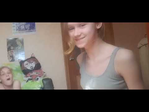 Girls doing couple yoga challenge.