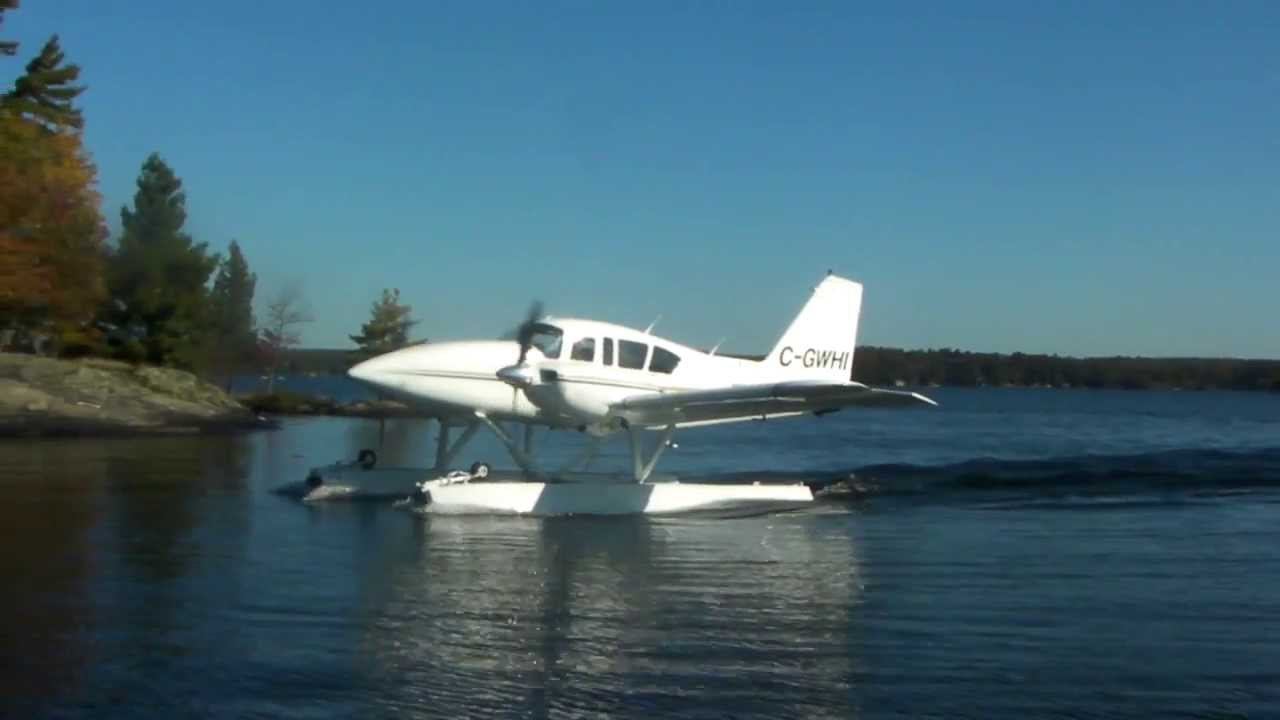 Piper Aztec Nomad taxiing on water - YouTube