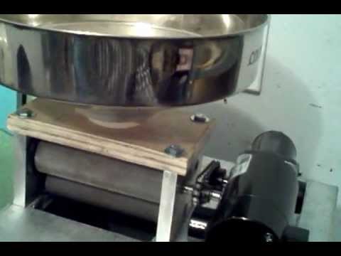 Cocoa Cracking machine - motor driven - CocoaTown.com - YouTube