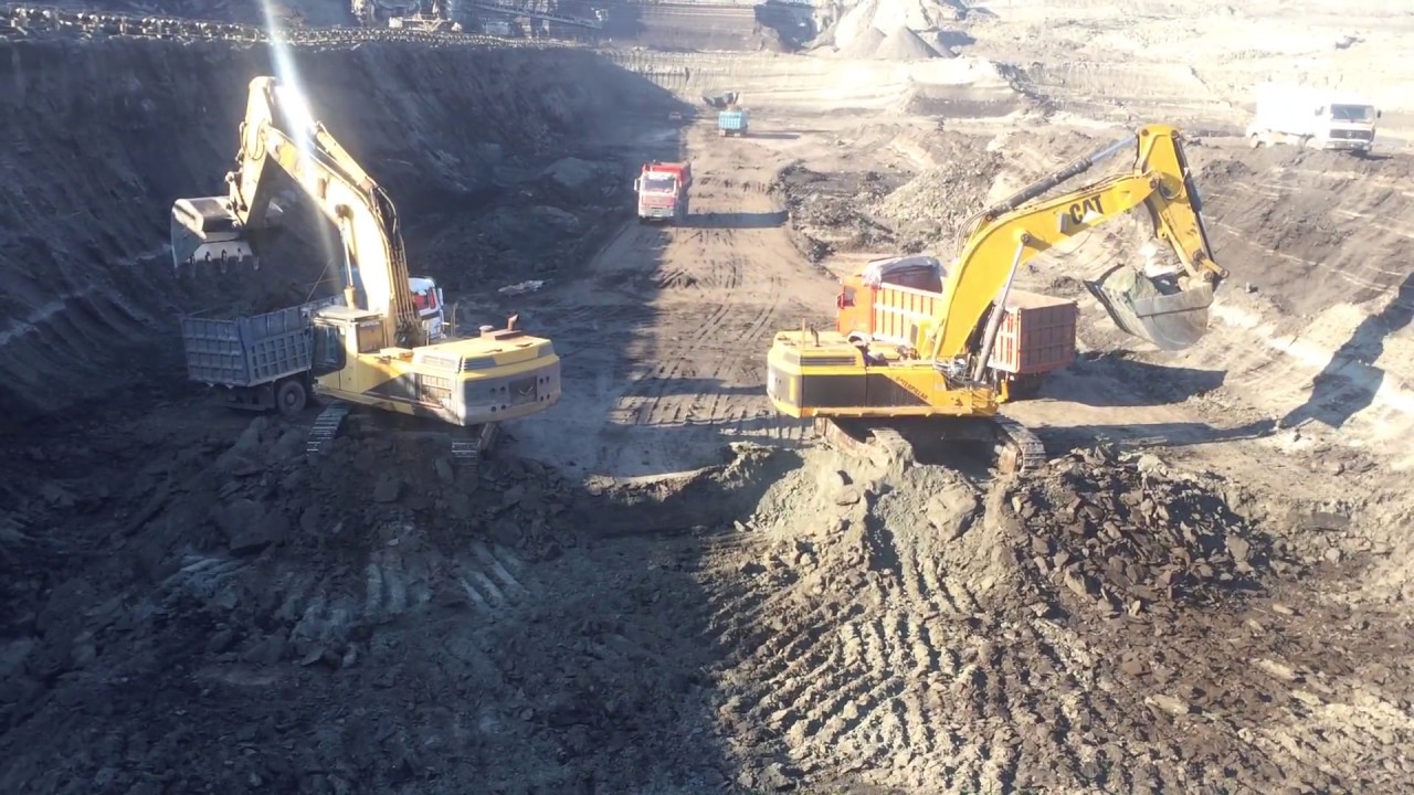 Two Caterpillar 375 Excavators Loading By Side - YouTube