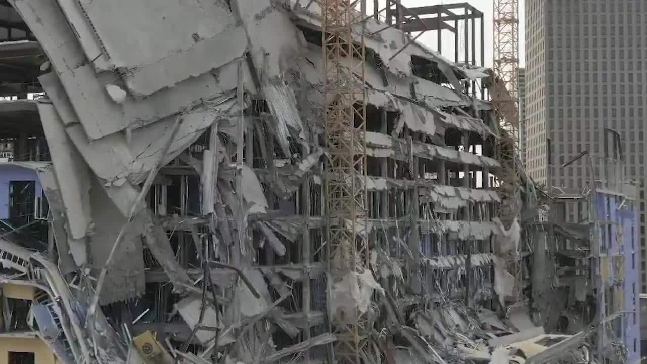 Drone footage shows aftermath of Hard Rock hotel collapse - YouTube