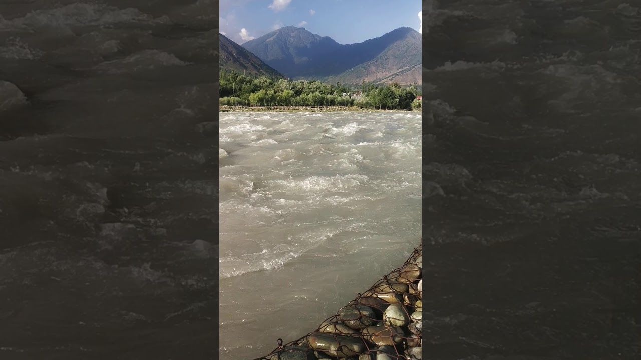 Nallah sindh flowing dangerously in mid June - YouTube
