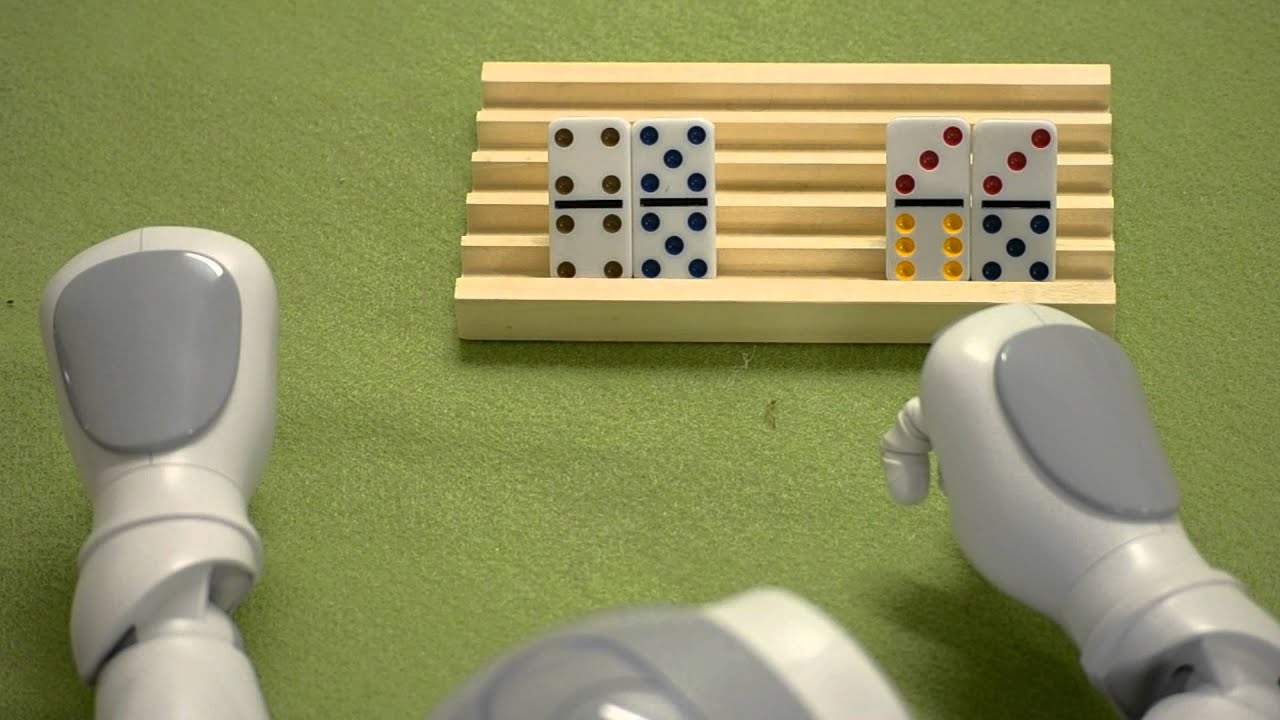 Humanoid robot plays intelligently spanish dominoes with humans or ...
