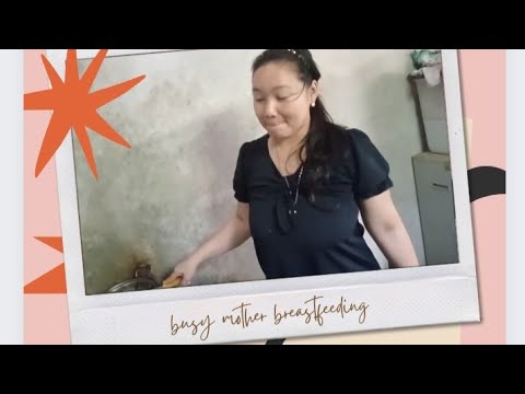 busy mother breastfeeding in the kitchen || Sibuk nya ibu menyusui di dapur