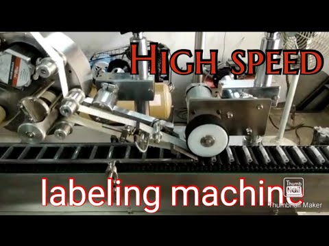 high speed blood collection tube labeling machine - YouTube