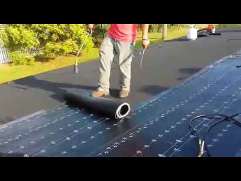 Modified torch down roof system installation - YouTube