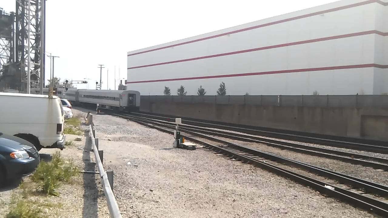 Amtrak train with old baggage/mail cars - YouTube