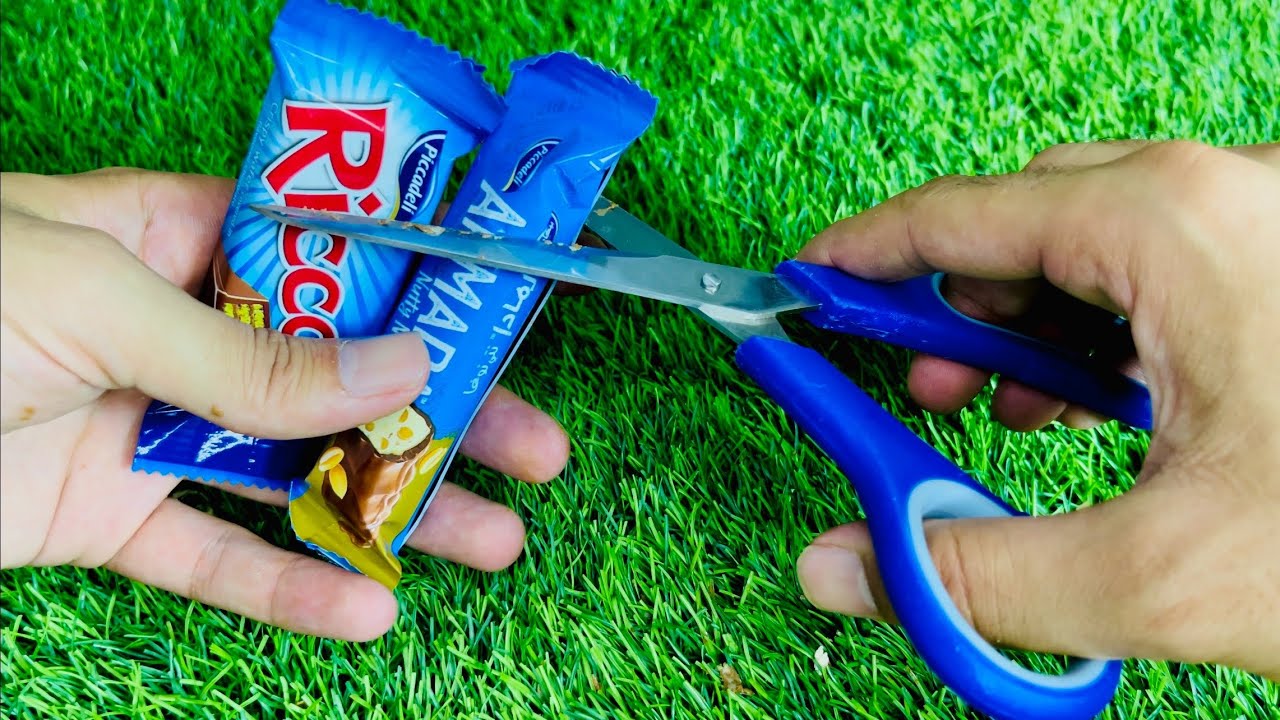 Satisfying Cutting of candy with scissors | cutting chocolate with ...
