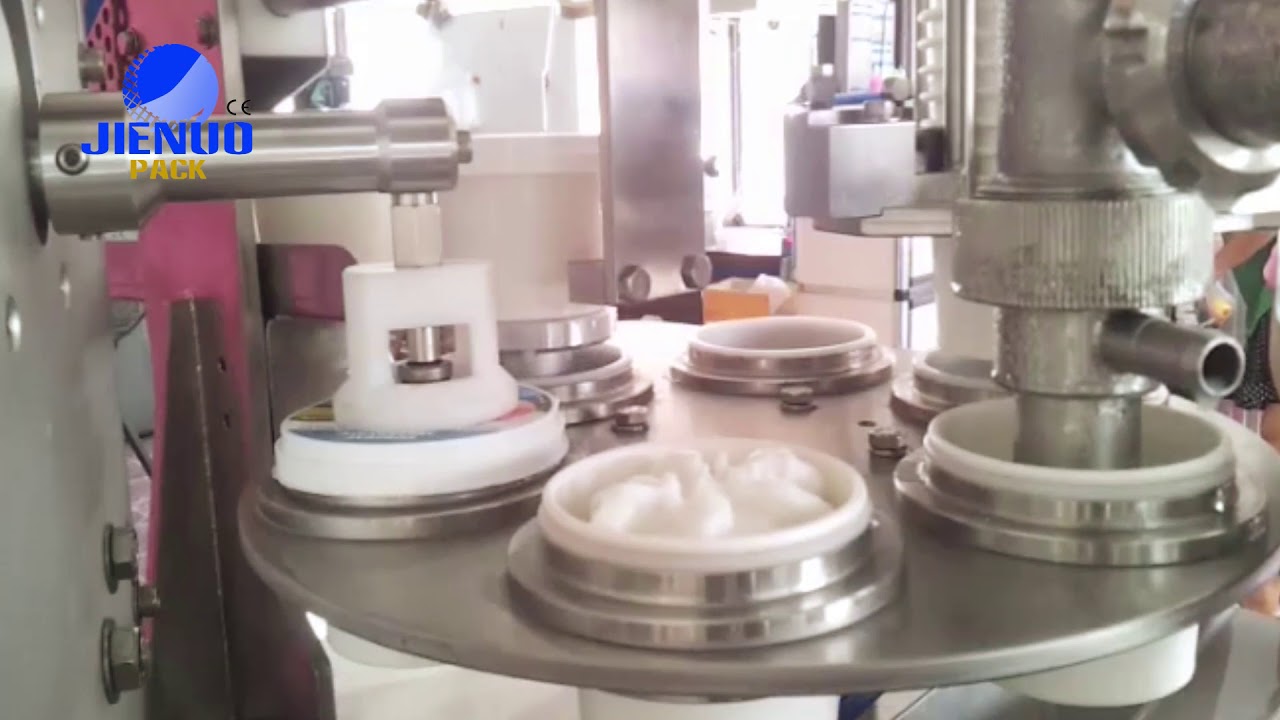 ice cream cup filling machine - YouTube