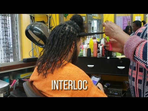 Starting his locs with interloc technique - YouTube
