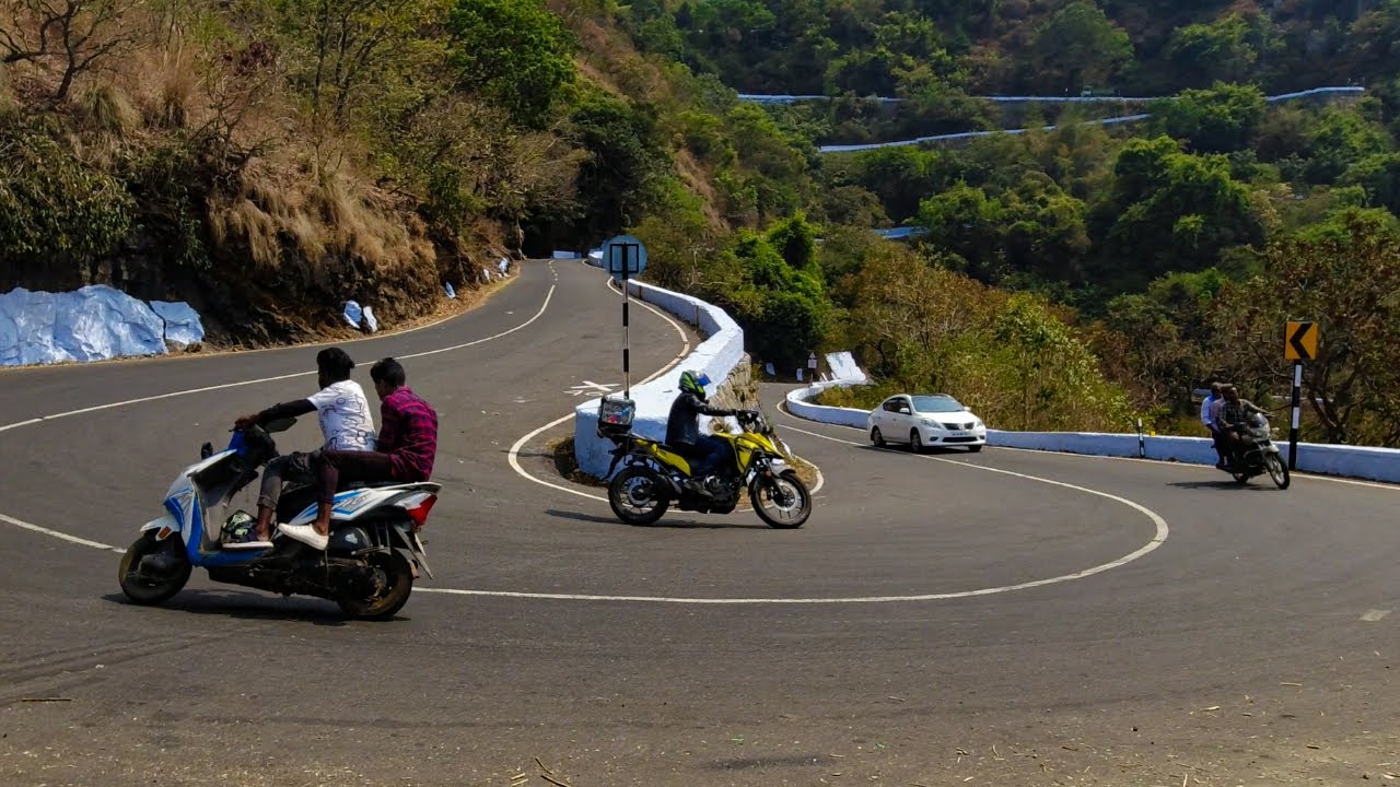 Vehicles Crossing Each Other at Valparai Hairpin Bend Ghat Road - YouTube