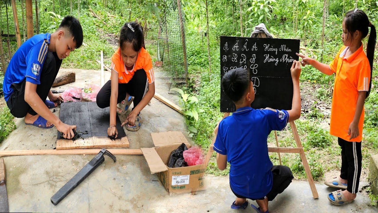 Two very smart orphans made blackboards by hand to teach each other to ...