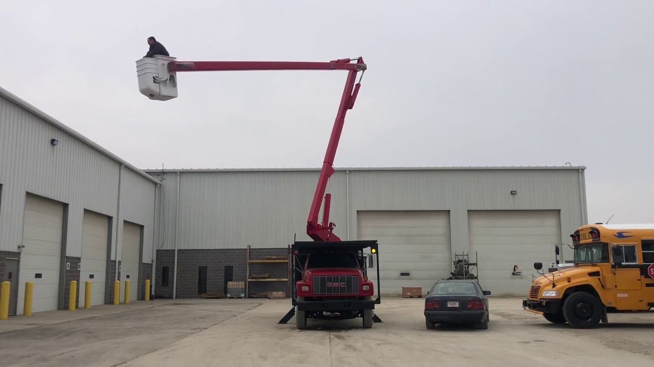 Forestry Elevator bucket truck With chipper dump box - YouTube
