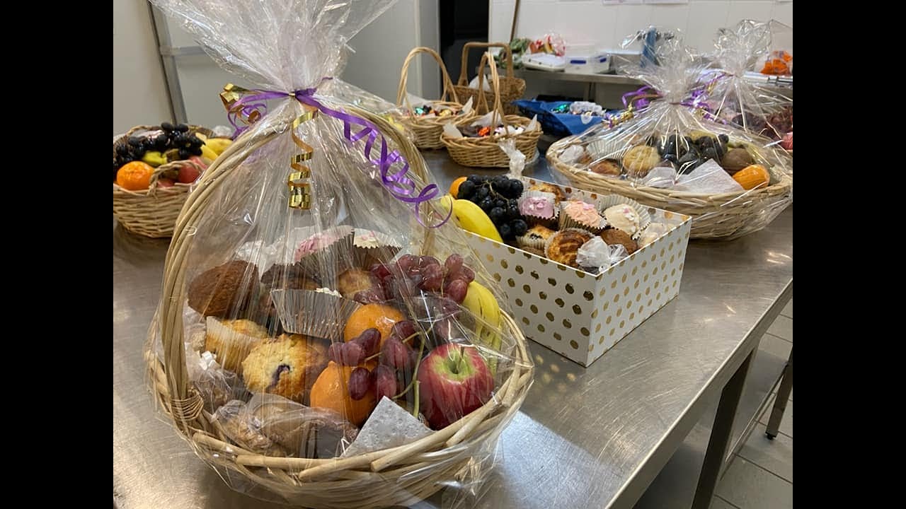 Frontline worker snack baskets project update - community service - YouTube