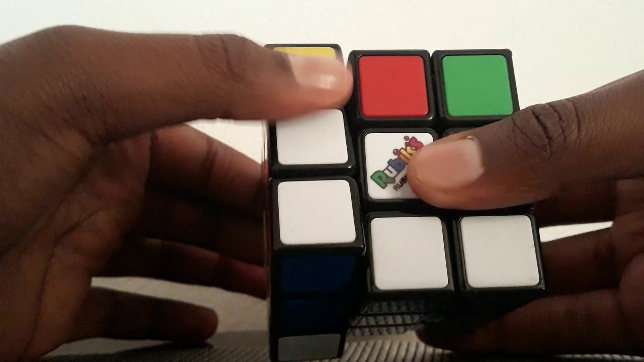How to solve a rubiks cube with 4 moves - YouTube