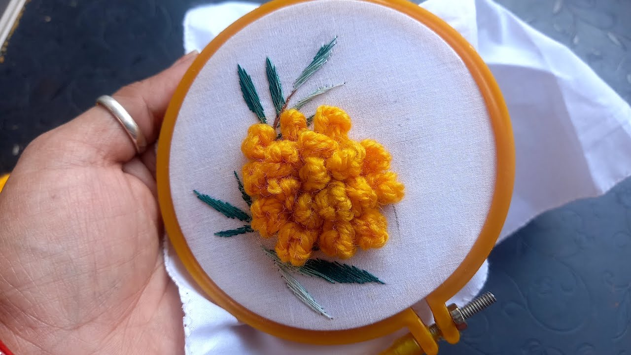 hand embroidery marigold flower and leaves - YouTube
