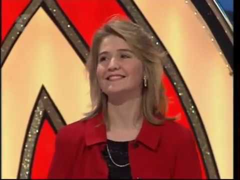 Woman Game show Contestant in Red Satin Blouse