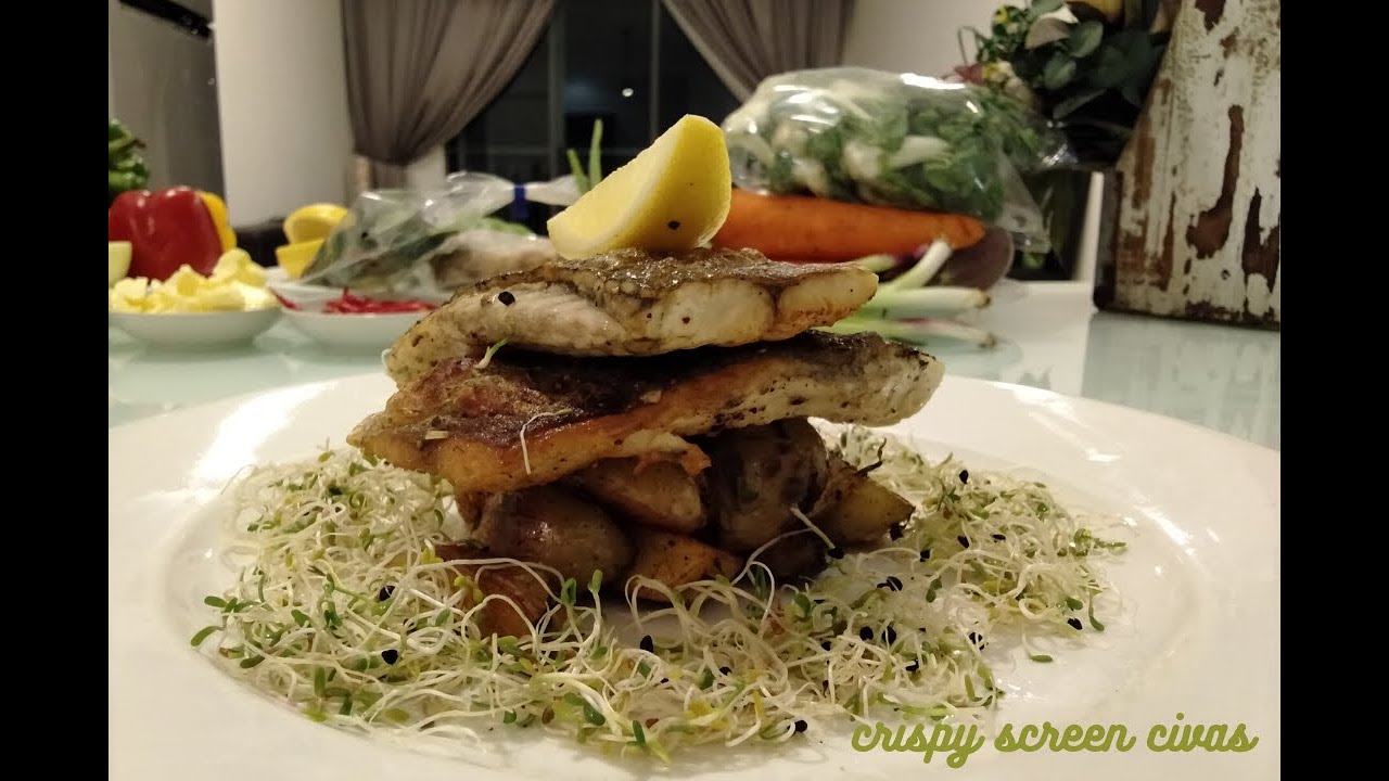 Pan fried crispy skin sea bass and roasted potato recipe.... - YouTube