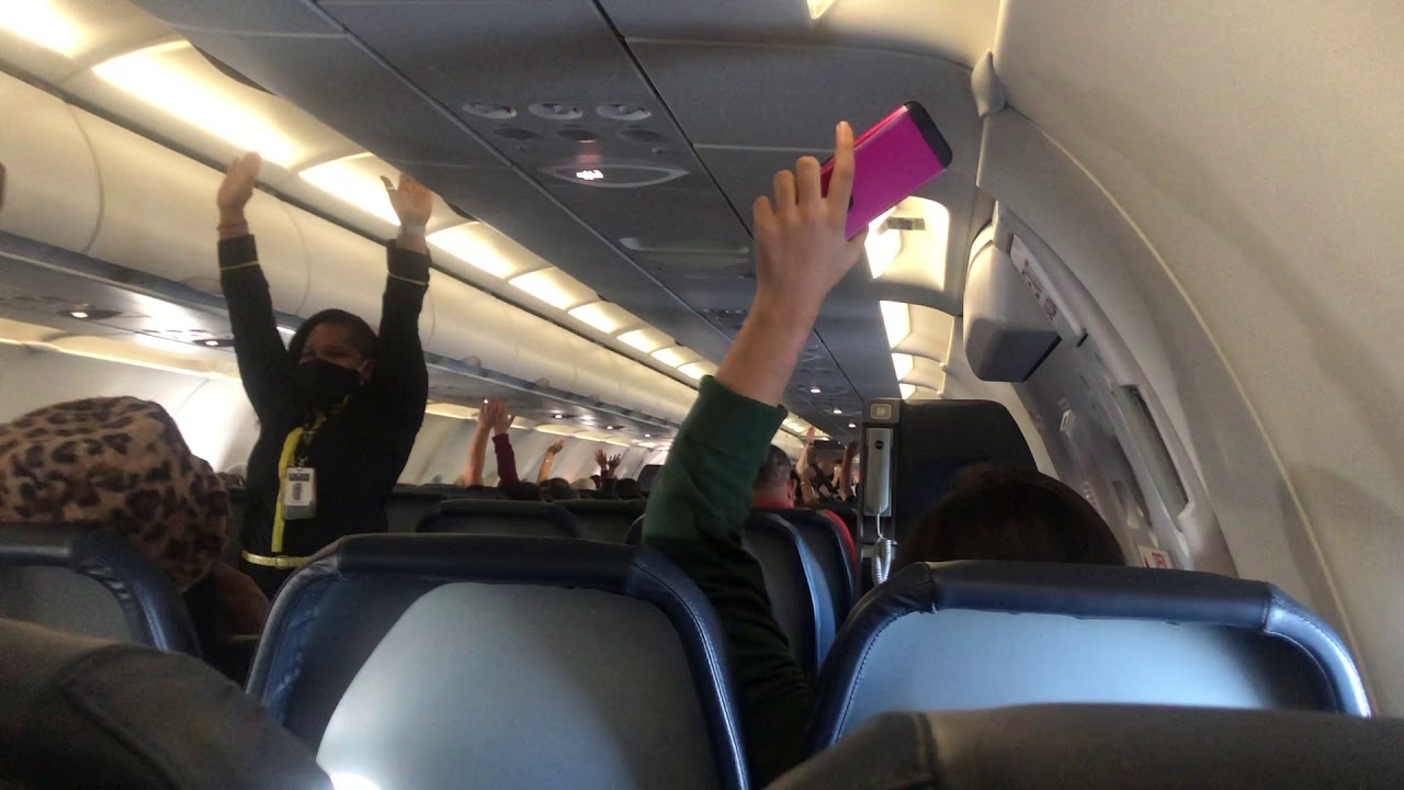 Hands up inside Spirit Airlines plane? - YouTube