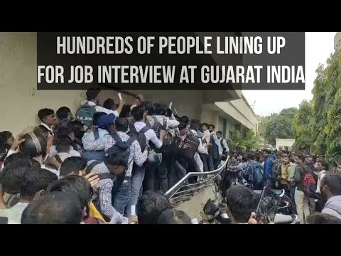 Hundreds of people lining up for a job interview. leading to a stampede ...