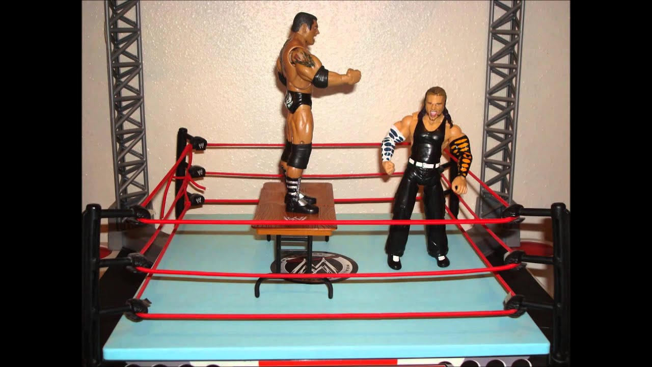 WWE Stopmotion: Batista Bomb Through Table - YouTube