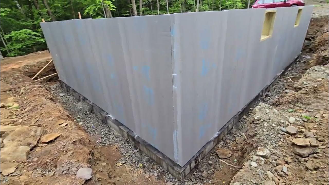 Foundation foam done and cement board being applied prior to ...