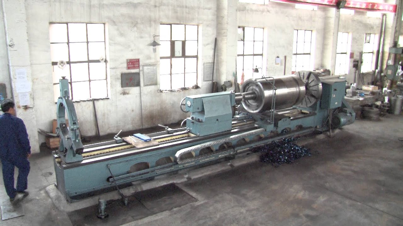 Flaking mill roll grinder to rough - YouTube