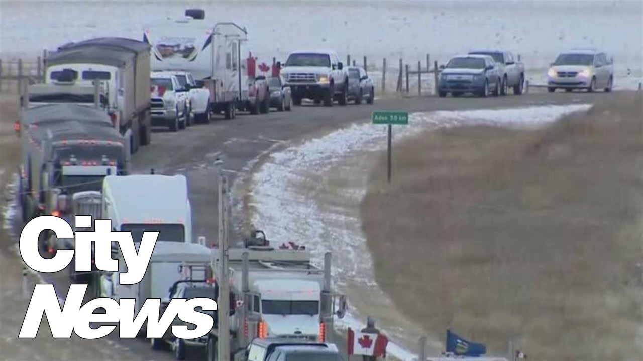 Truckers stranded on both sides of border as protestors block Coutts ...