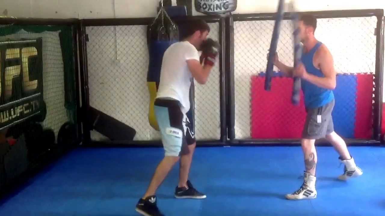 Boxing using defence sticks - YouTube