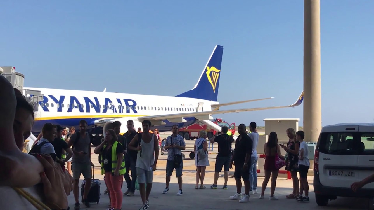 RYanair 8841 evacuation after phone fire 3 - YouTube