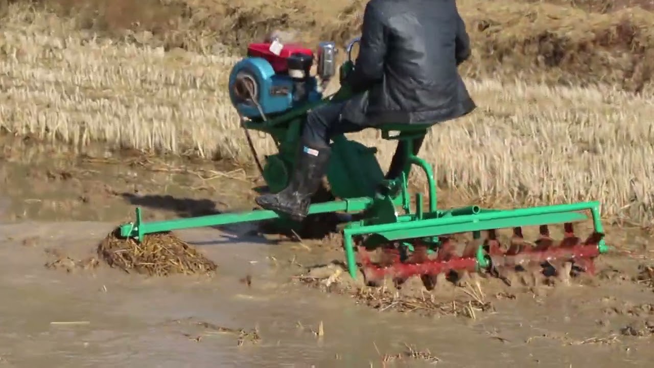 paddy field single wheel tractor - YouTube