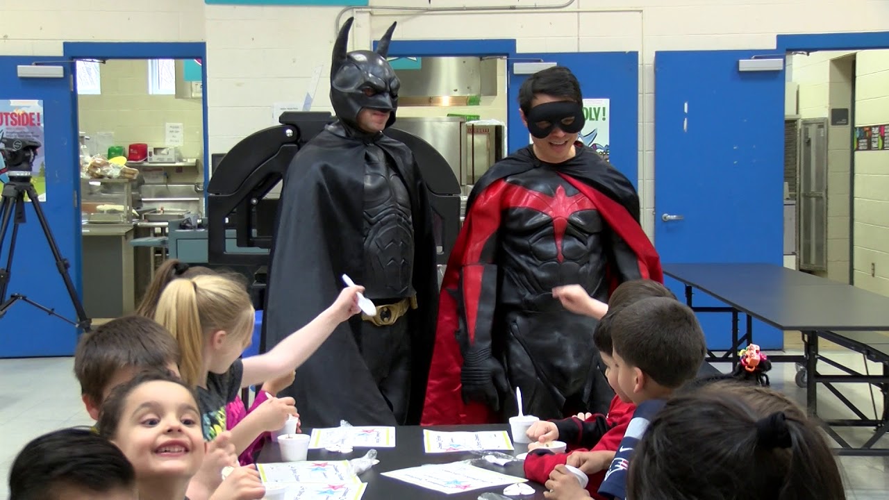 BATMAN AND ROBIN SUPPORT E.N. WHITE SCHOOL ATTENDANCE - YouTube