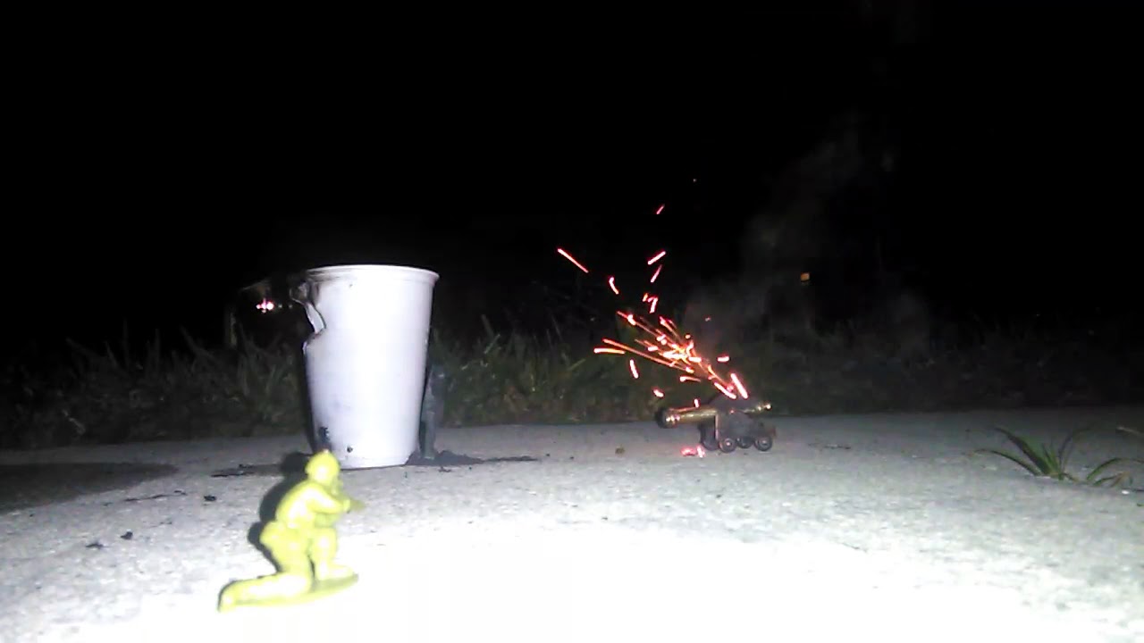 Mini cannon firing and igniting gunpowder - YouTube