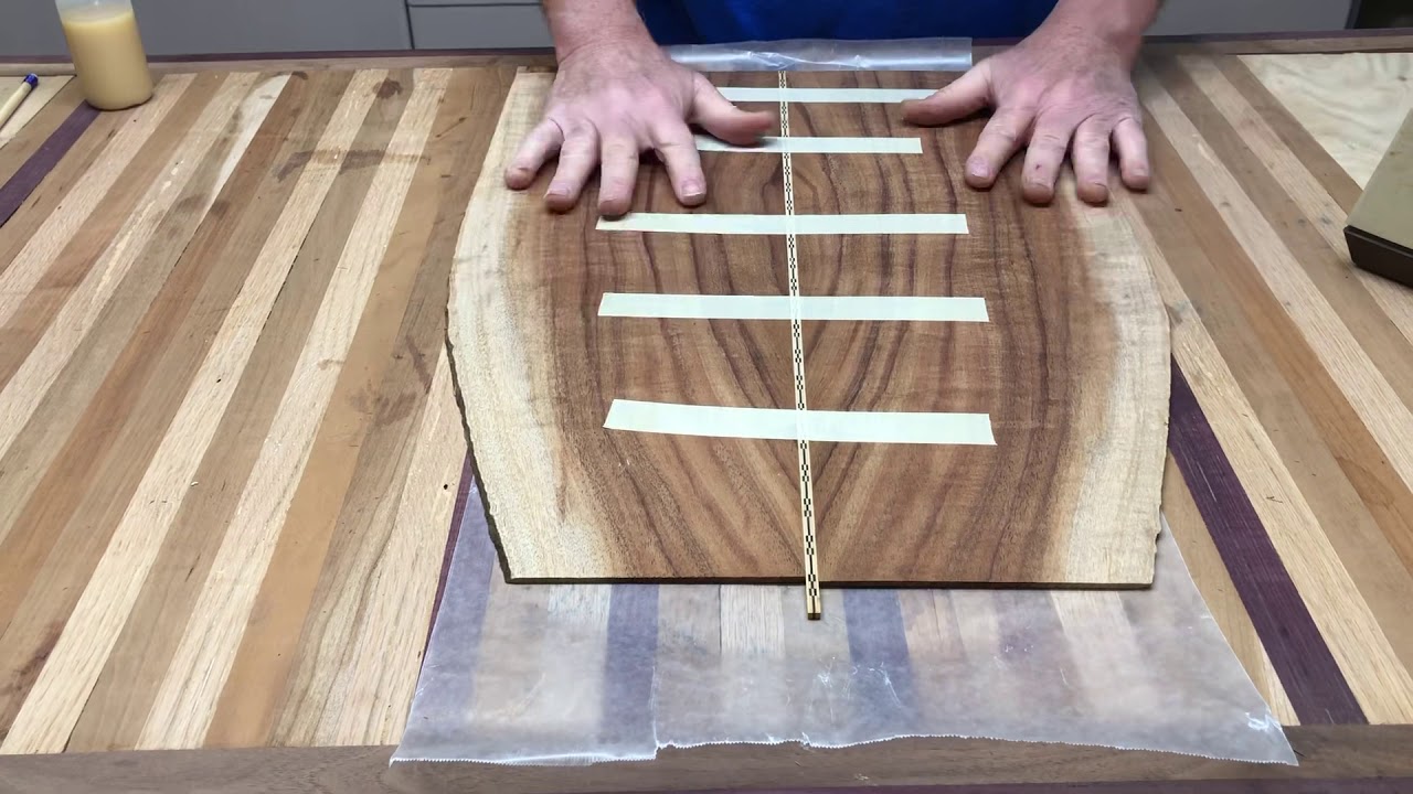 Joining and gluing the back of a guitar. - YouTube
