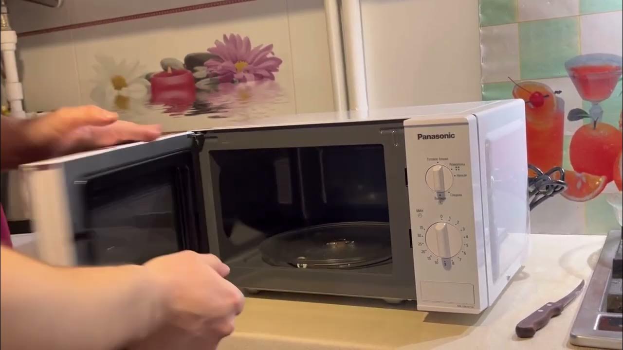 Розпакування мікрохвильовки Panasonic NN-SM221W з Rozetka - YouTube