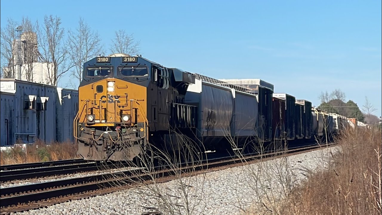 CSX X409-11 Lots of Tropicana juice cars & Epic trash containers ES44AH ...