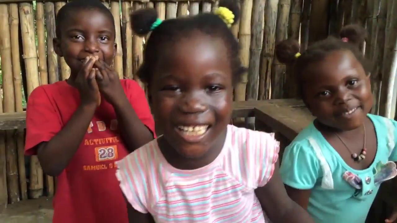 Liberian children sing "We Are Rising" school theme song at Africa ...