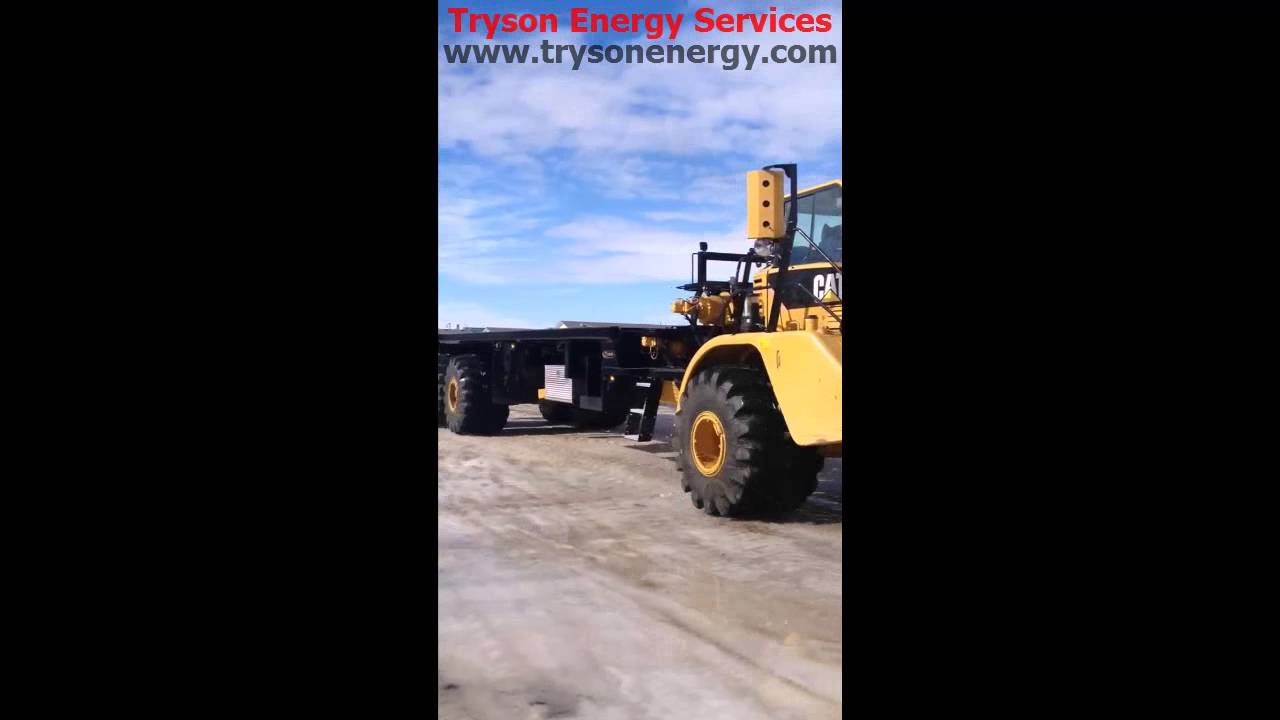 Tryson Energy Services - CAT 740B Bed Truck Conversion - YouTube