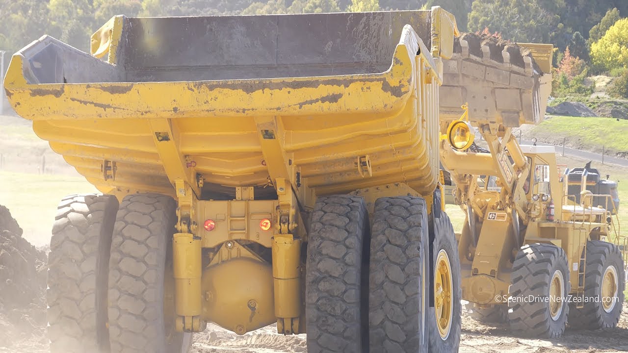 Old Caterpillar 992B Wheel Loader and CAT 769B Haul Truck Working at ...