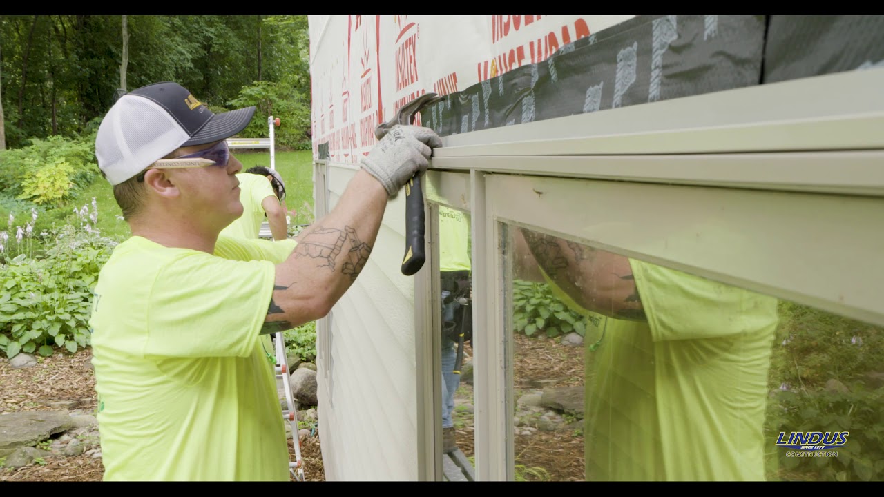 Lindus Construction Steel Siding MN Project - YouTube